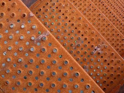 Rusty Industrial Perforated Steel - Seamless Texture